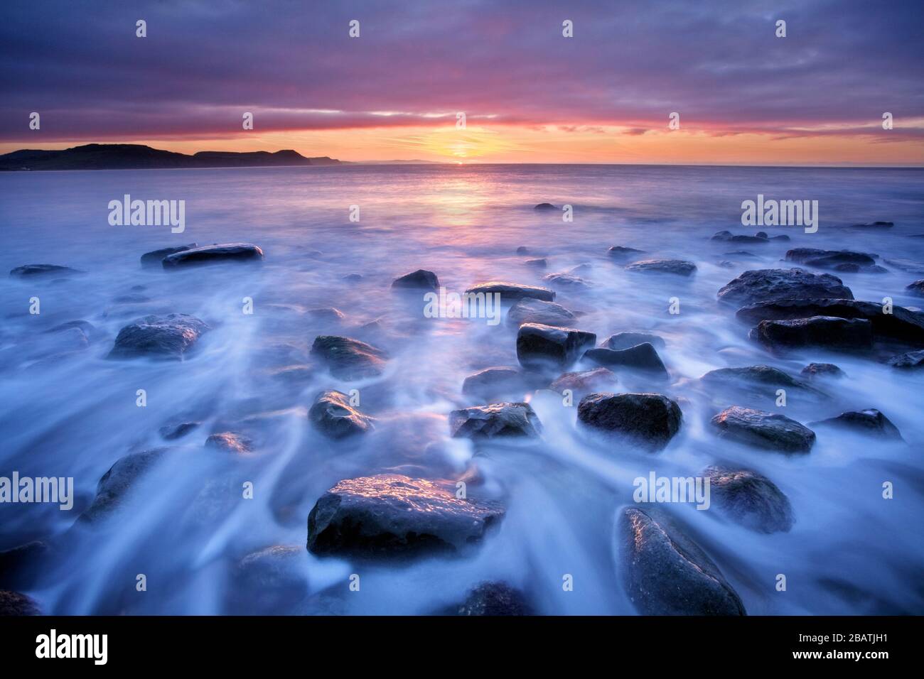 Sunrise over Lyme Bay, Dorset, England Stock Photo - Alamy