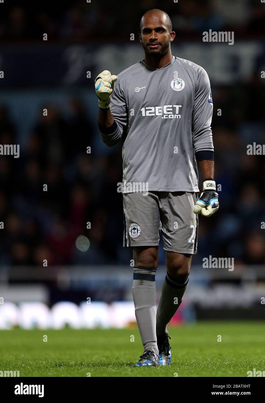 Wigan Athletic's goalkeeper Ali Al Habsi celebrates his sides fourth ...