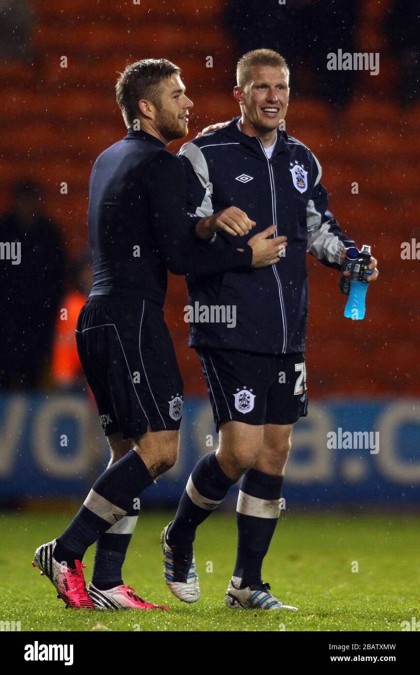 Huddersfield Town's Keith Southern and Adam Clayton (left) celebrate ...