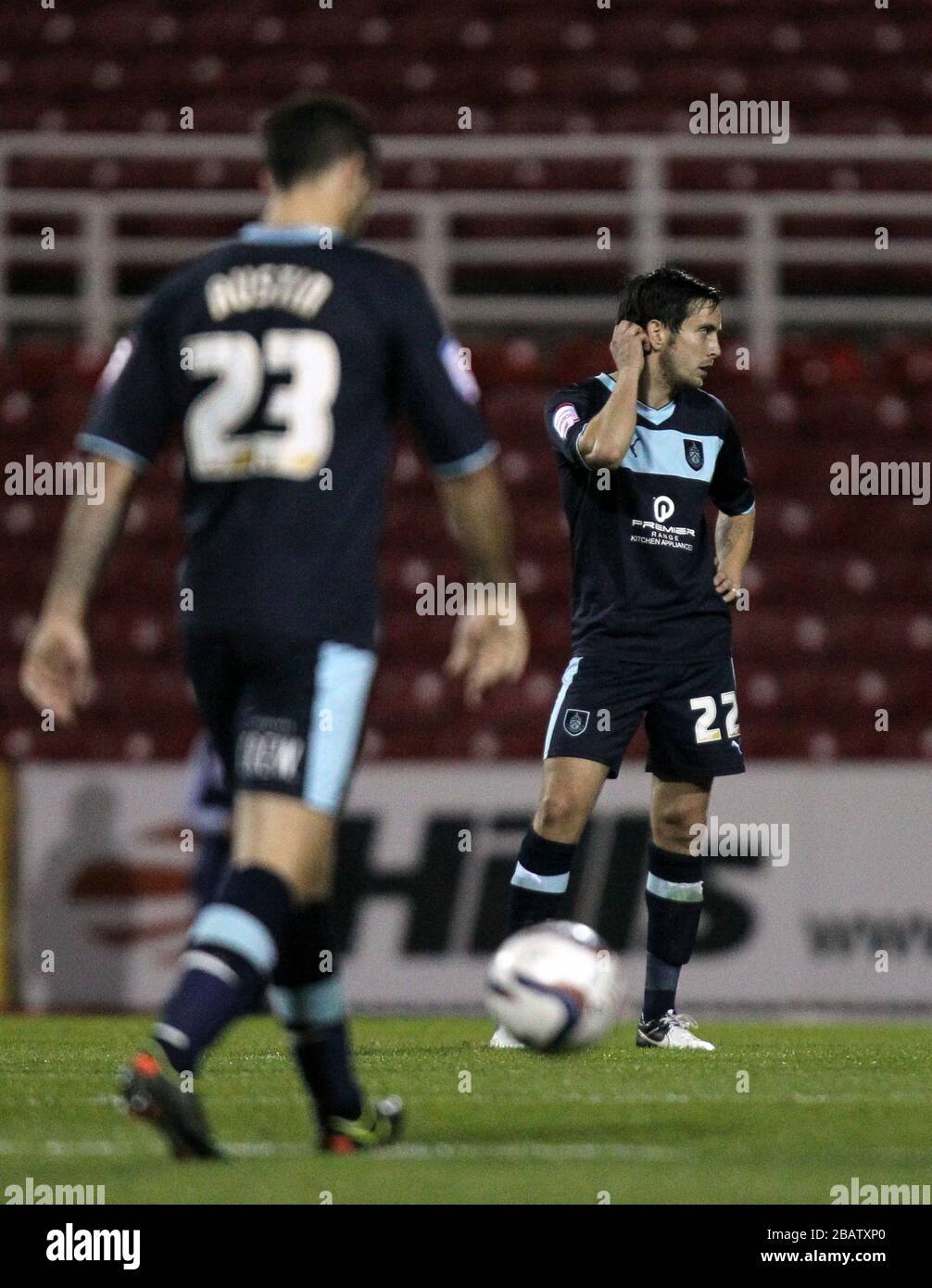 Burnley's Charlie Austin and Brian Stock (right) stand dejected Stock ...