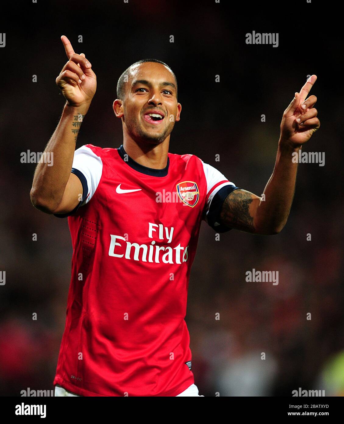 Arsenals theo walcott celebrates his goal hi-res stock photography and ...