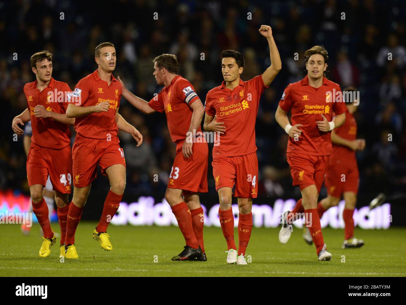 Liverpool's Nuri Sahin (4) celebrates scoring their first goal Stock ...