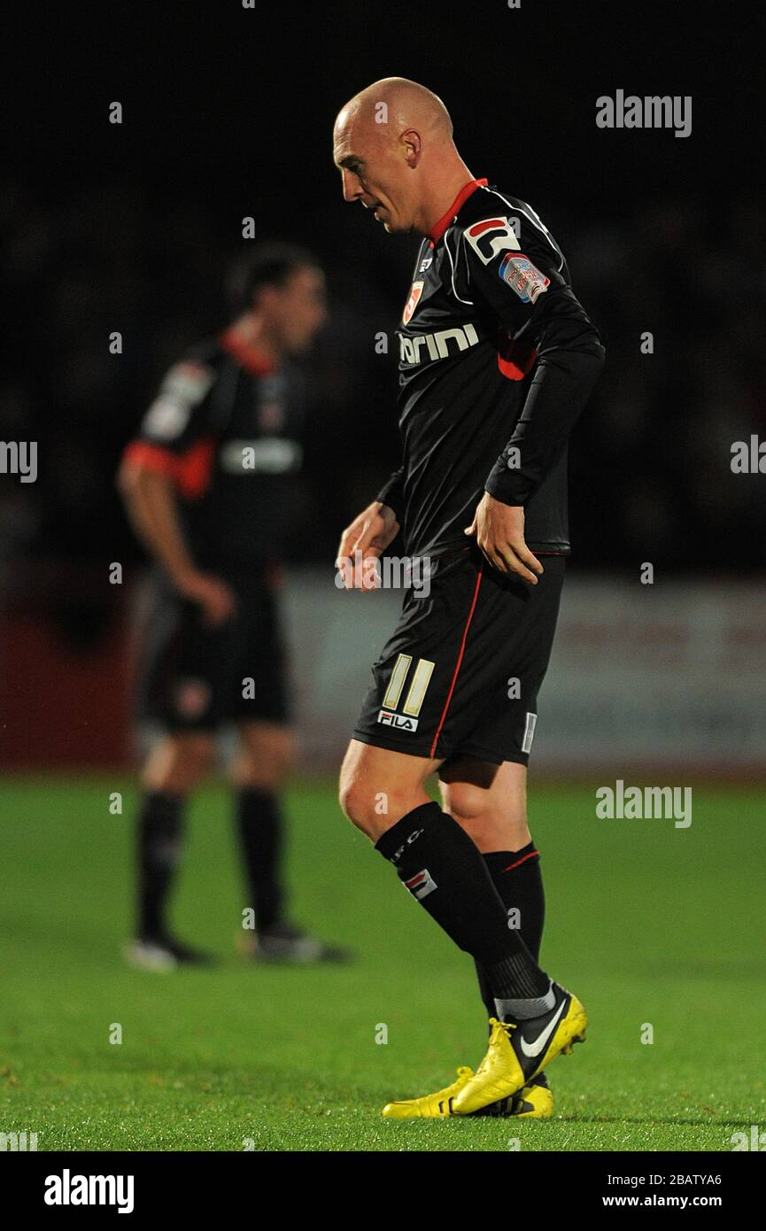 Morecambe's Kevin Ellison shows his dejection as he is sent off by ...
