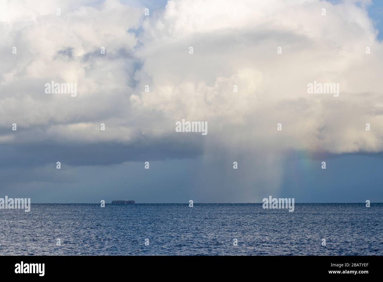 Sun Through Rain Clouds