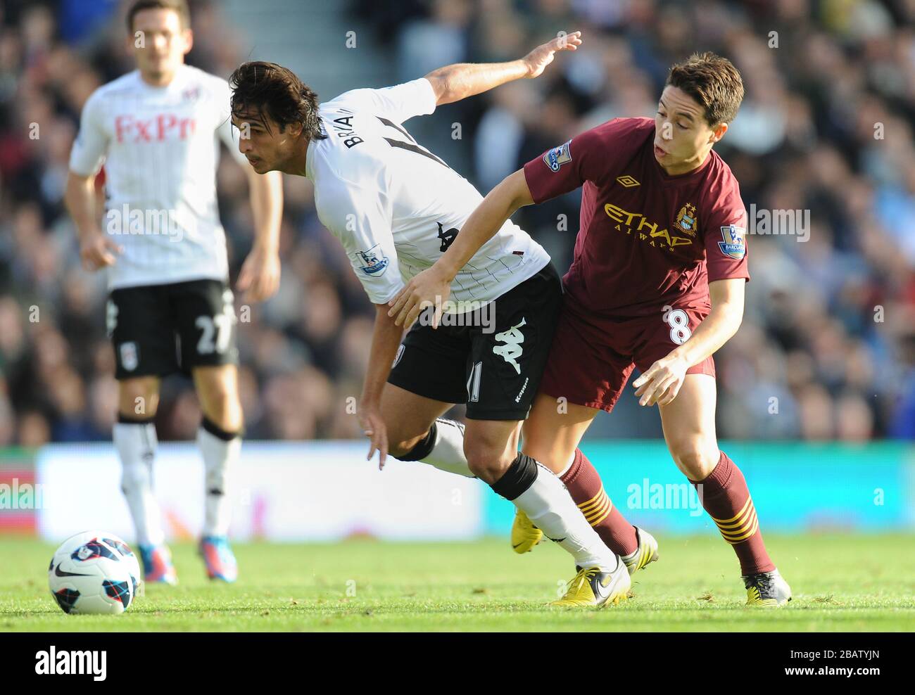 Fulham's Bryan Ruiz and Manchester City's Samir Nasri battle for the ...