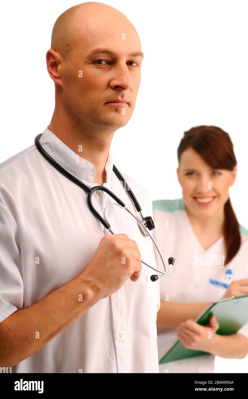 Two medical assistants with notes and stethoscope Stock Photo - Alamy