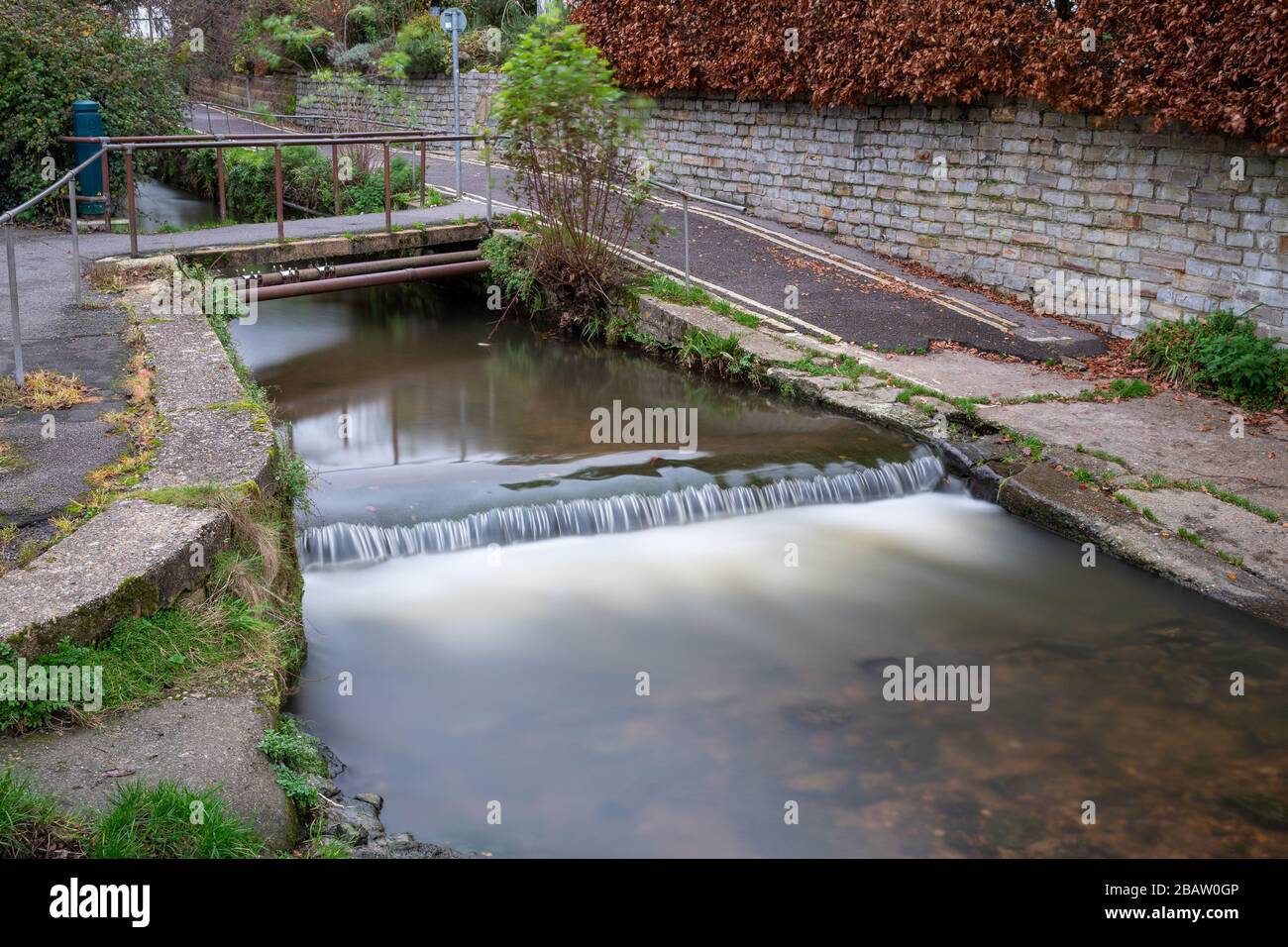 Long exposure of a watefall on the River Lim walkway at Lyme Regis in ...