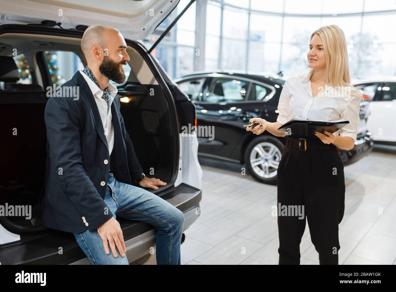 Seller car salesman female hi-res stock photography and images - Alamy