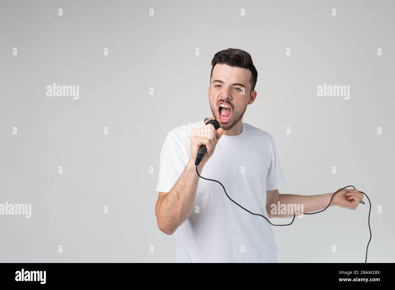 Hold microphone hi-res stock photography and images - Alamy