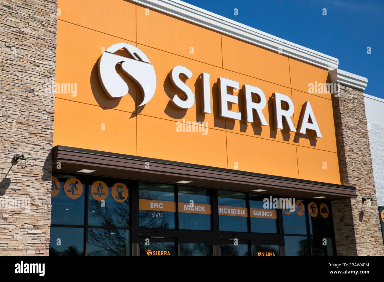 A logo sign outside of a Sierra retail store location in Frederick ...