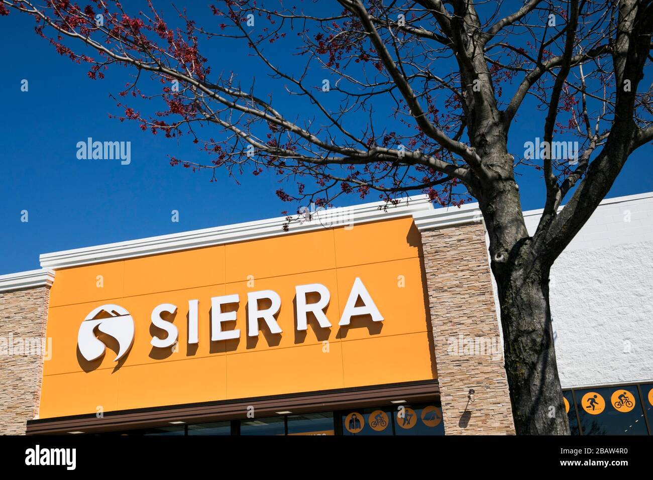 A logo sign outside of a Sierra retail store location in Frederick ...