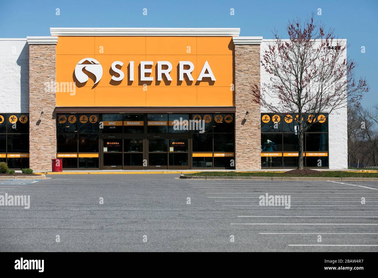 A logo sign outside of a Sierra retail store location in Frederick ...
