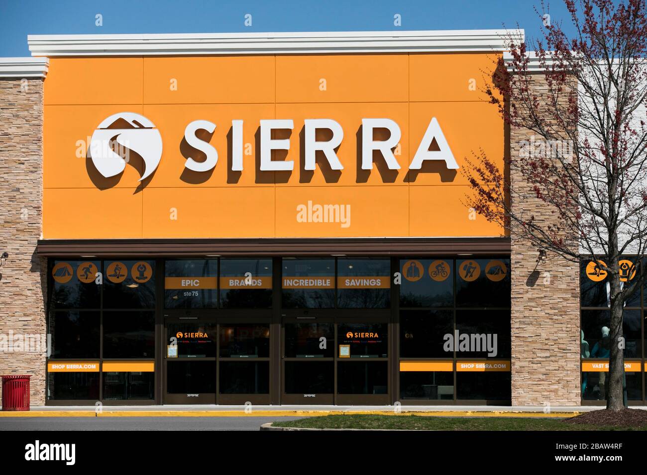 A logo sign outside of a Sierra retail store location in Frederick ...