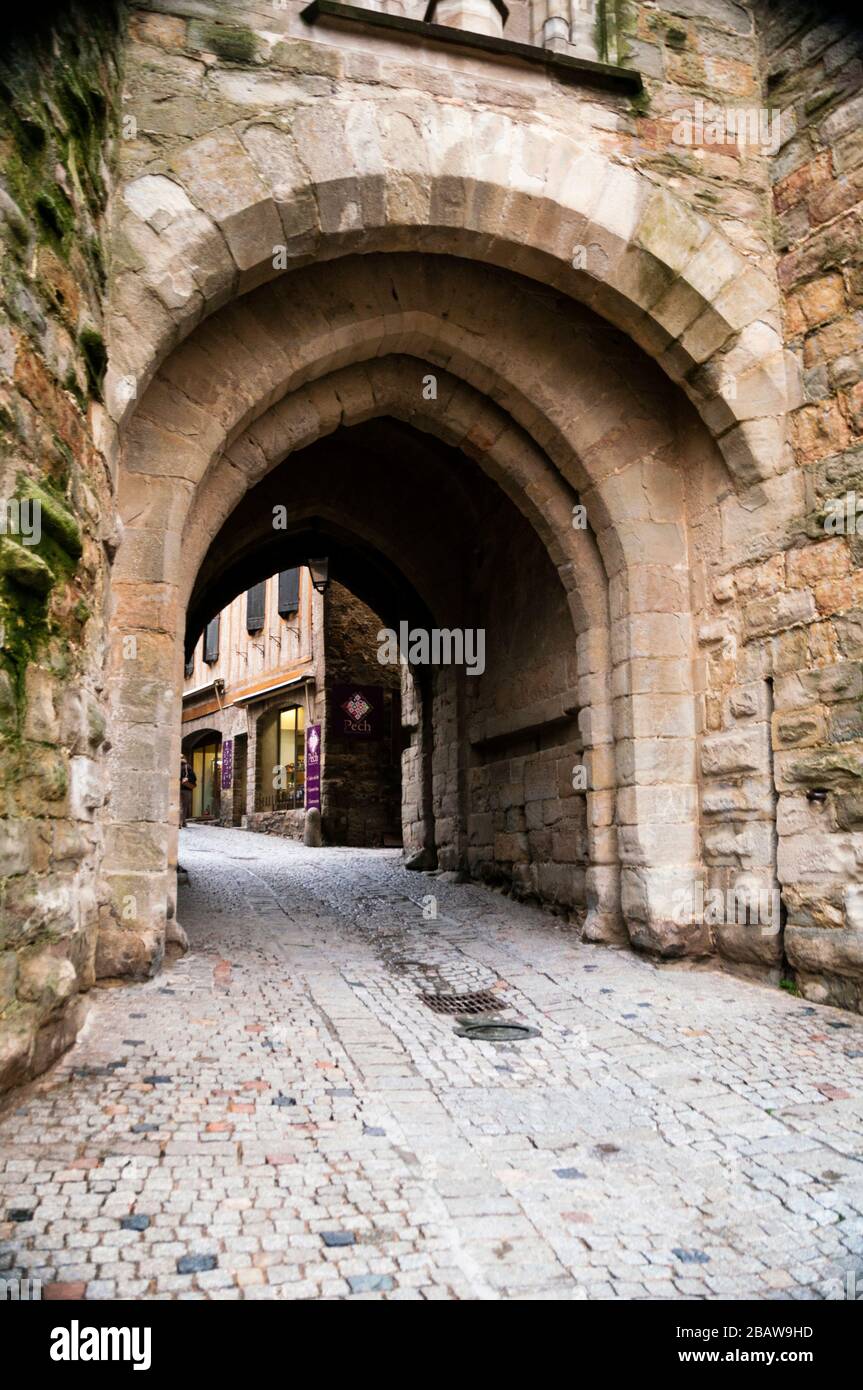 Thick stone pointed arch gate to Carcassonne, France Stock Photo - Alamy