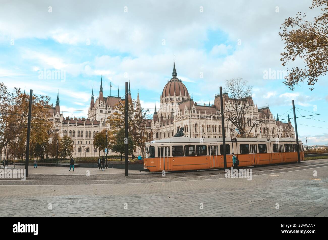 Budapest, Hungary - Nov 6, 2019: Public yellow tram riding in front of ...