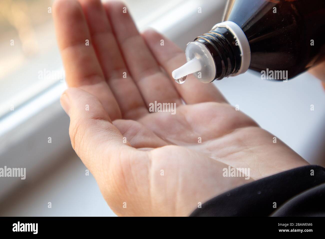 Means of protection against virus infection. Hand disinfection Stock ...