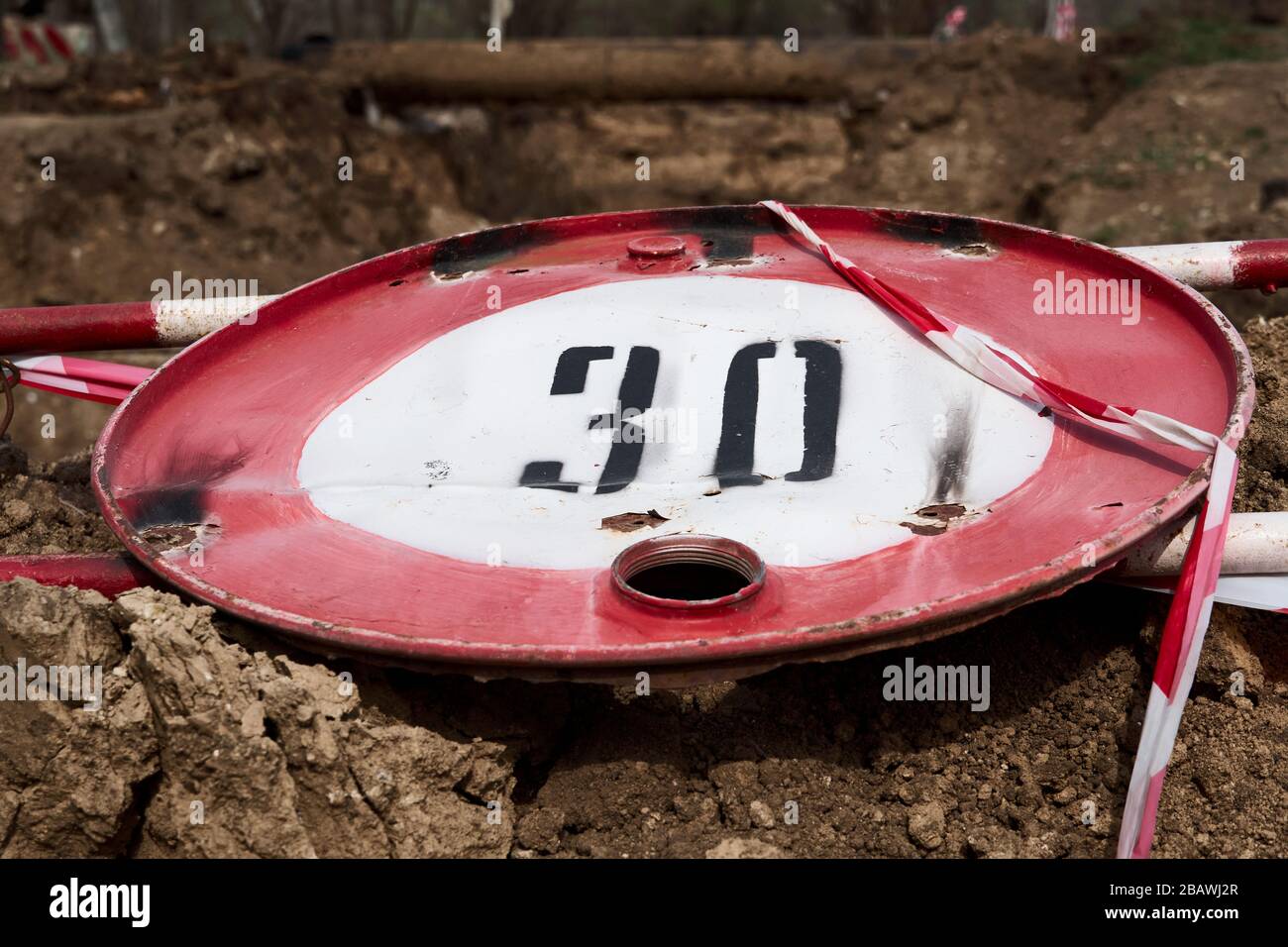 the road sign for the speed limit of thirty kilometers or miles per ...