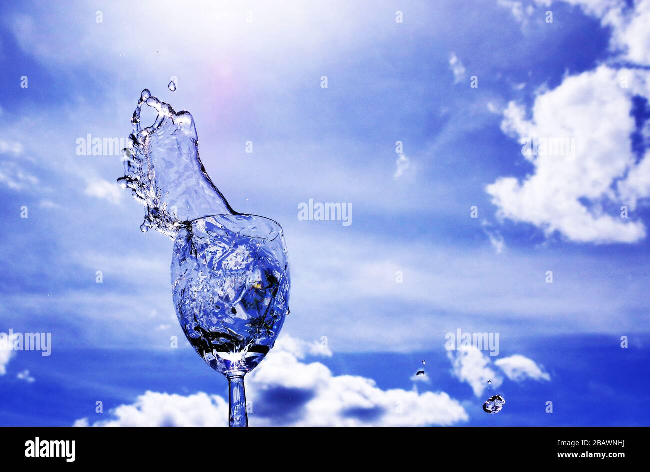 Water splashing from wine glass Stock Photo - Alamy
