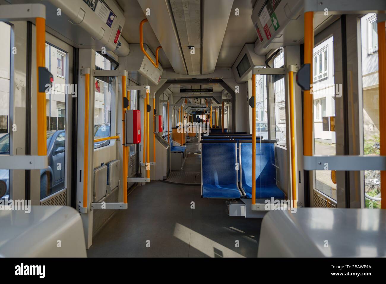 Interior view of a corridor inside passenger trains with blue fabric ...