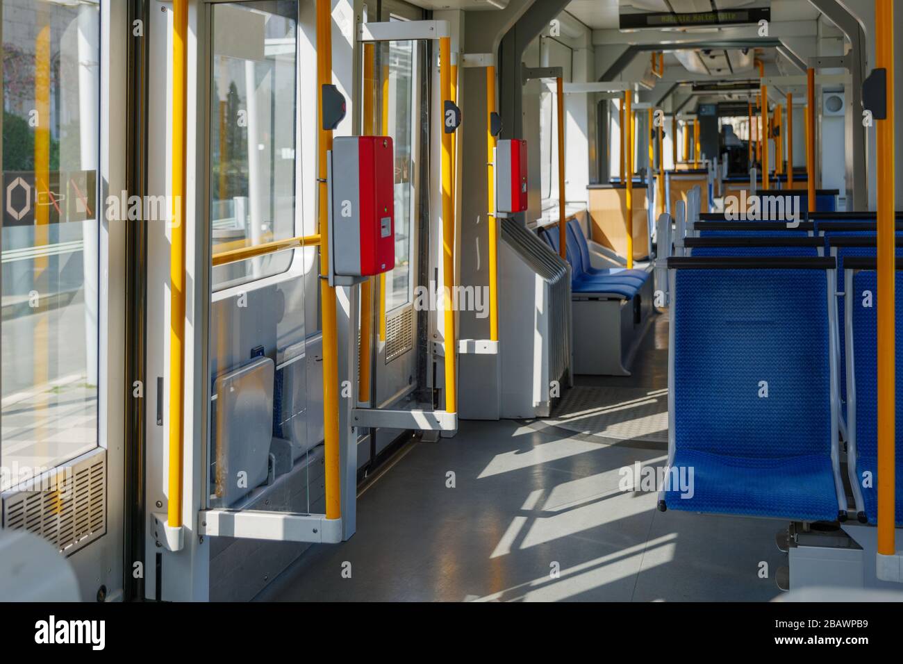 Interior view of a corridor inside passenger trains with blue fabric ...