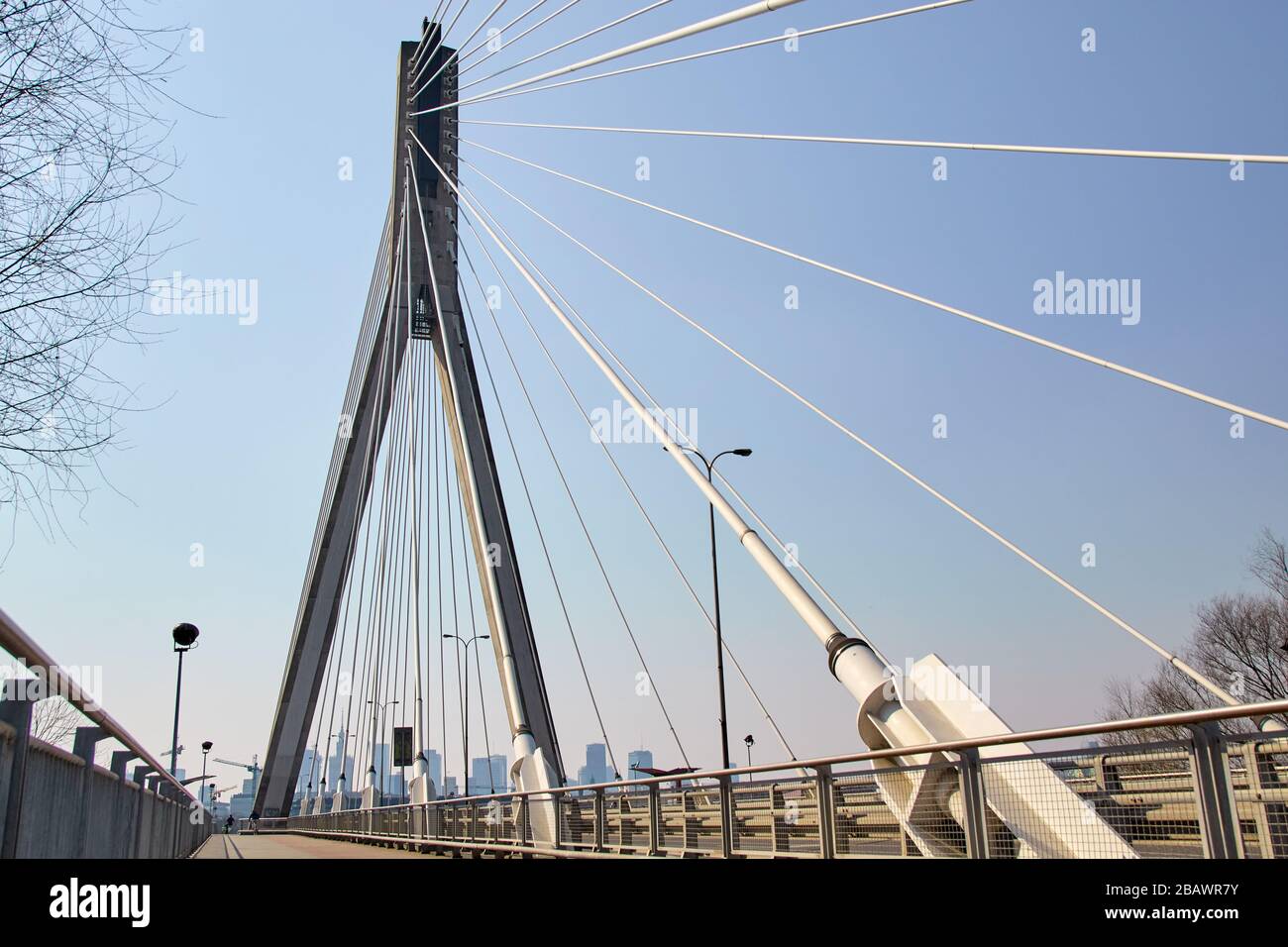 Warsaw skyscrapers scape seen throught bridge pylons Stock Photo - Alamy