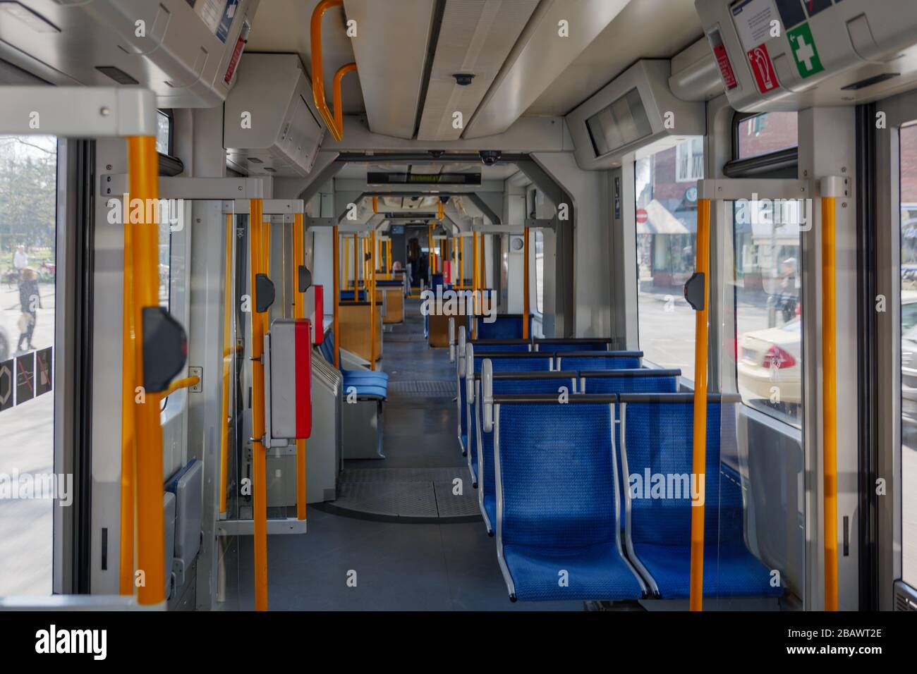 Interior view of a corridor inside passenger trains with blue fabric ...