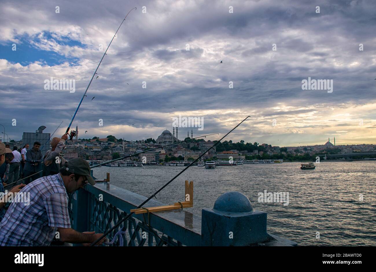 Fishermen at the Galata Bridge, Fisherman fishing in Istanbul on June ...