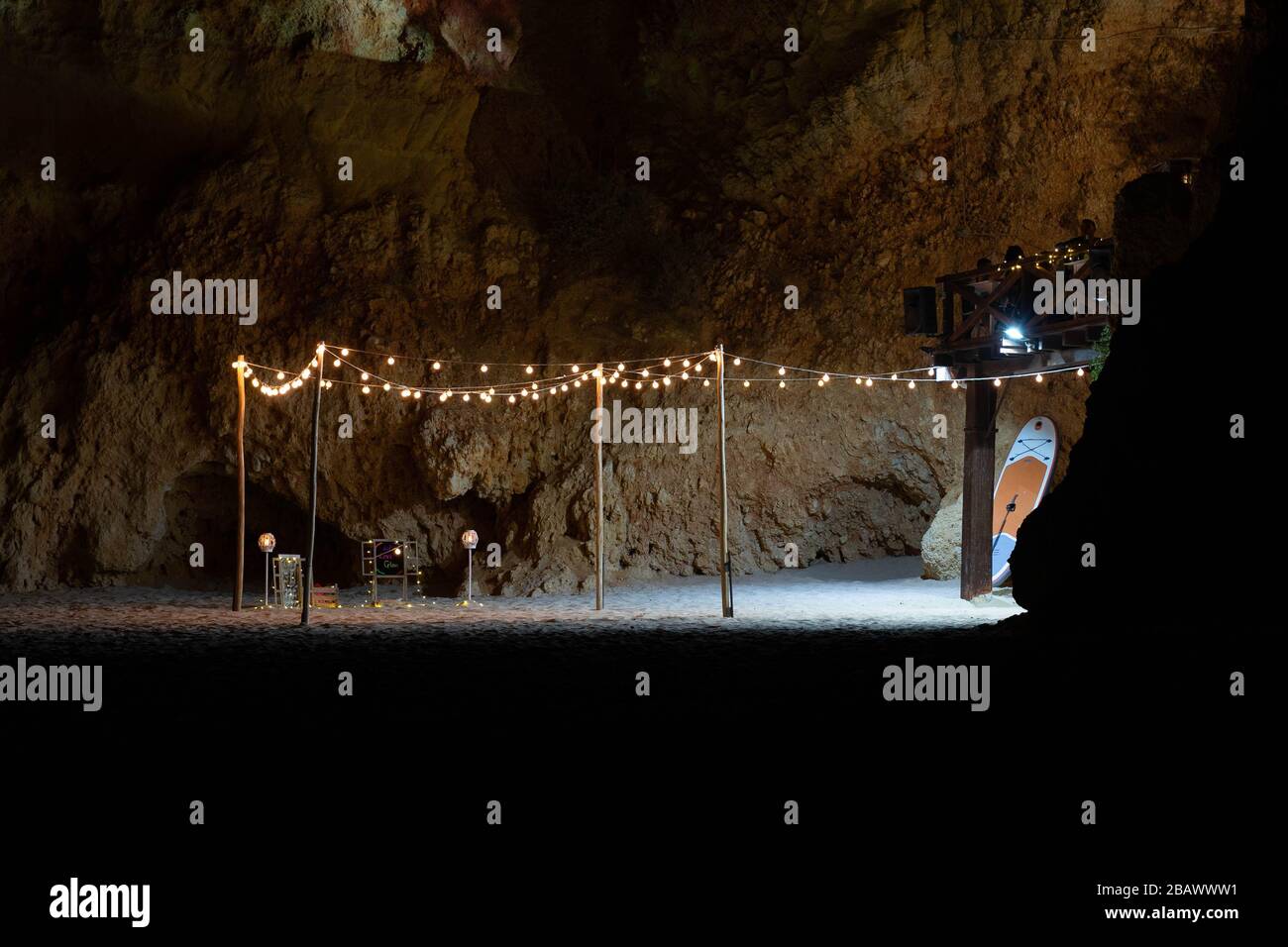 open air cinema with projector on the beach. people having party Stock ...