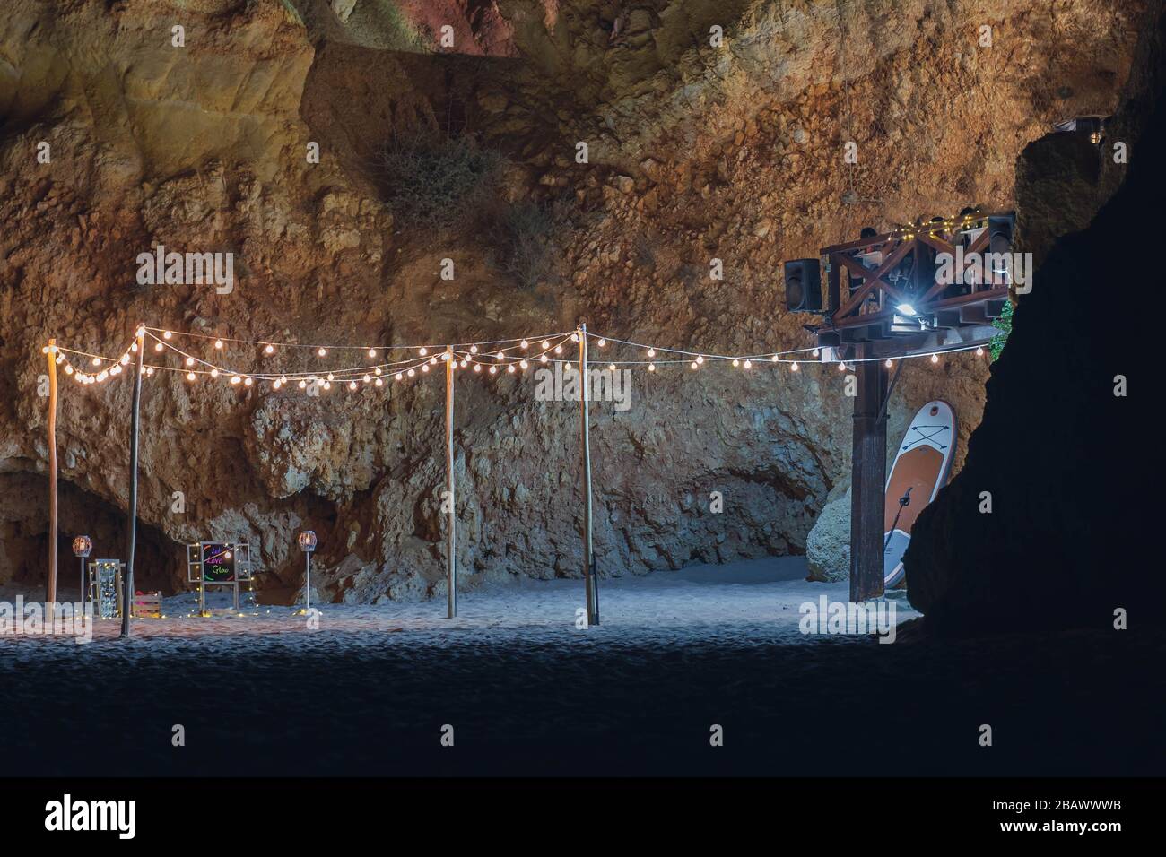 open air cinema with projector on the beach. people having party Stock ...