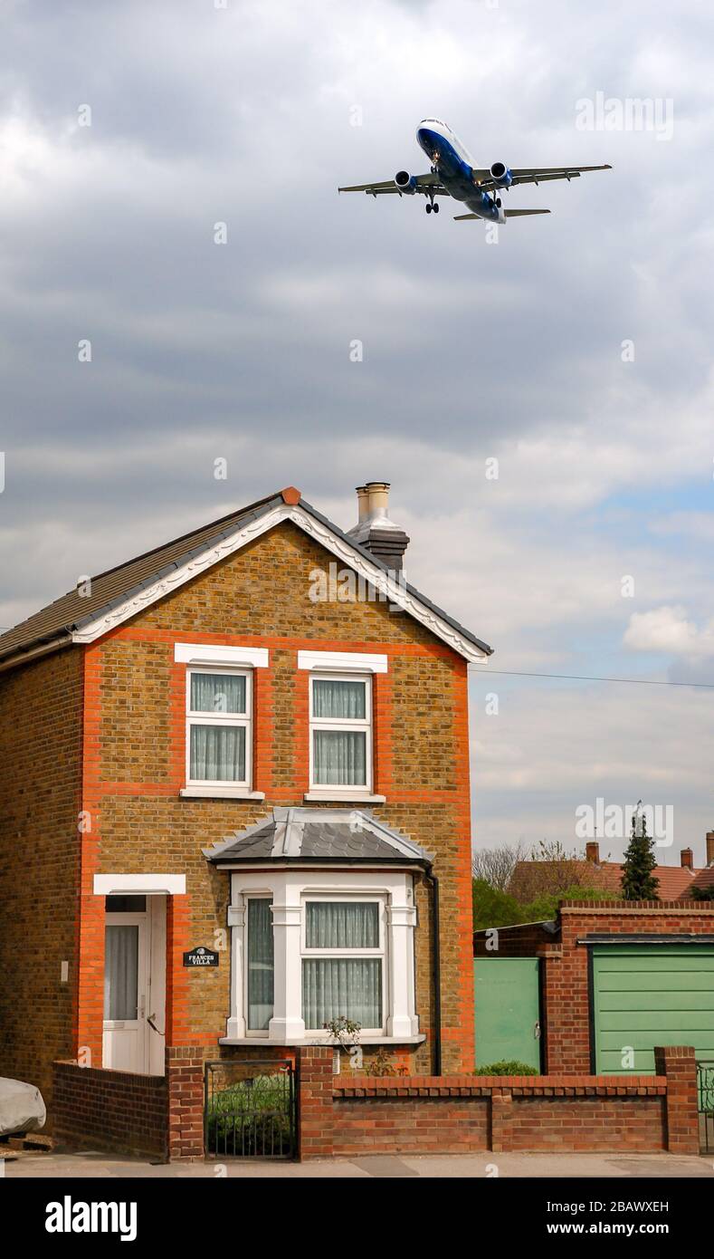 LONDON HEATHROW AIRPORT, ENGLAND - APRIL 2007: House on the flight path ...