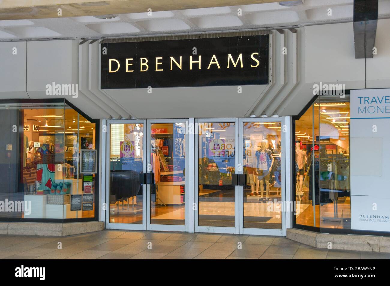 CARDIFF, WALES - JULY 2019: Signs above an entrance to Debenhams ...