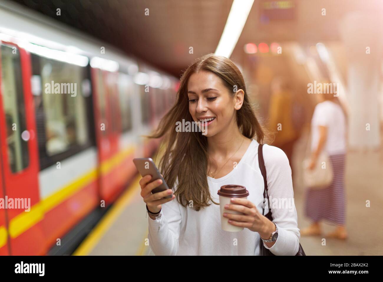 Woman subway coffee hi-res stock photography and images - Alamy