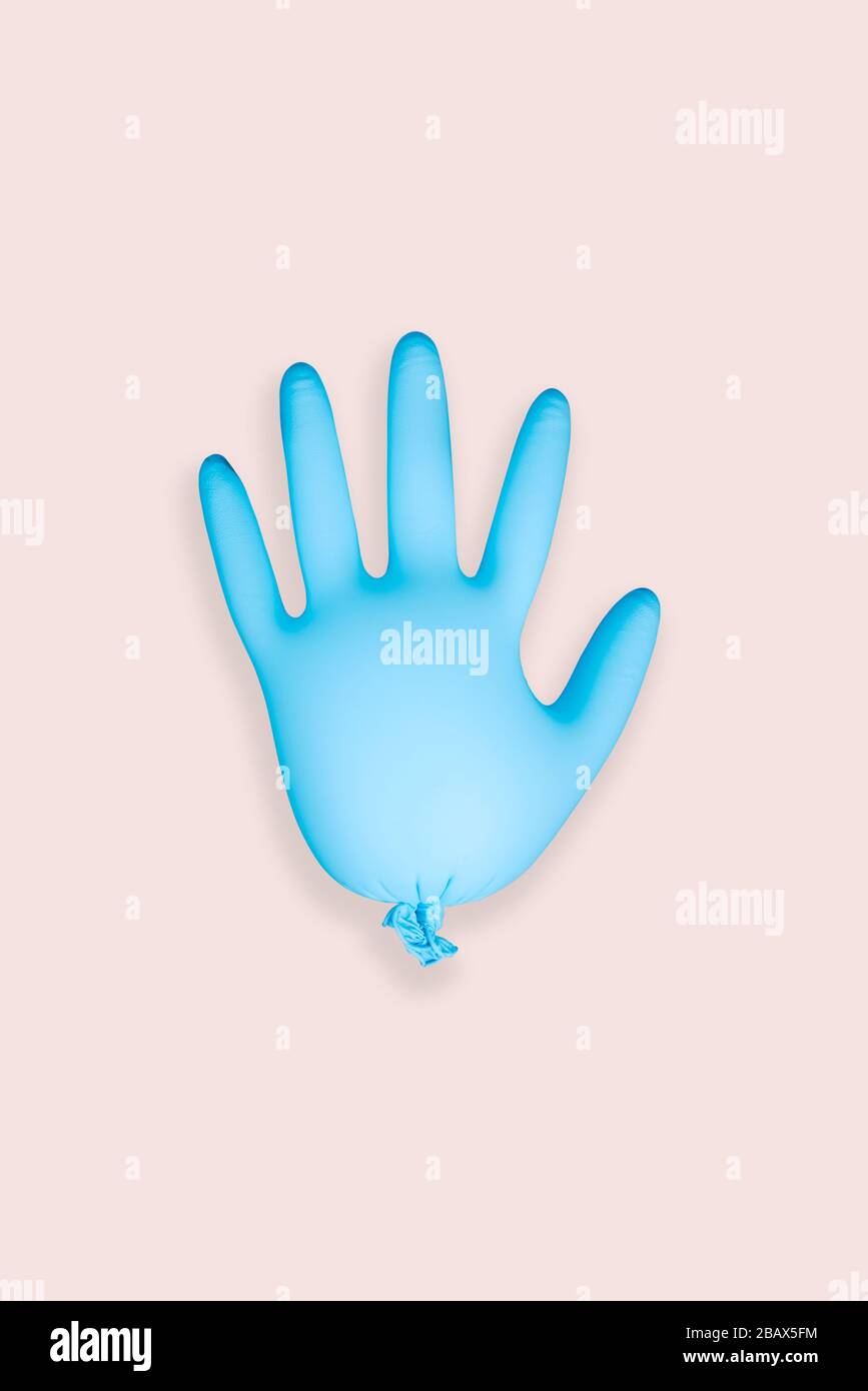Gloved hand on trendy background. Cleaning Hands Concept Stock Photo ...