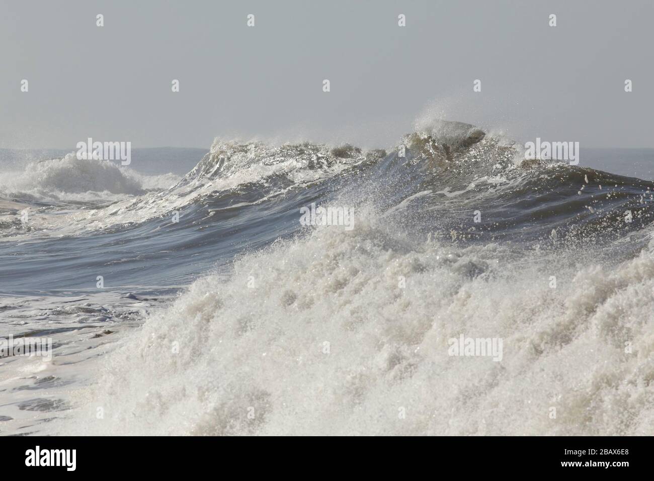 Top of a big breaking wave Stock Photo - Alamy