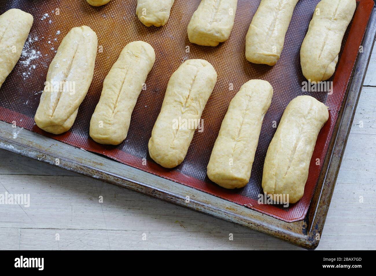 Baking homemade hot dog bread rolls Stock Photo - Alamy