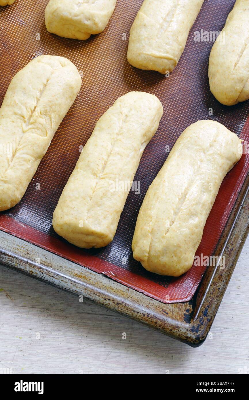 Baking homemade hot dog bread rolls Stock Photo - Alamy