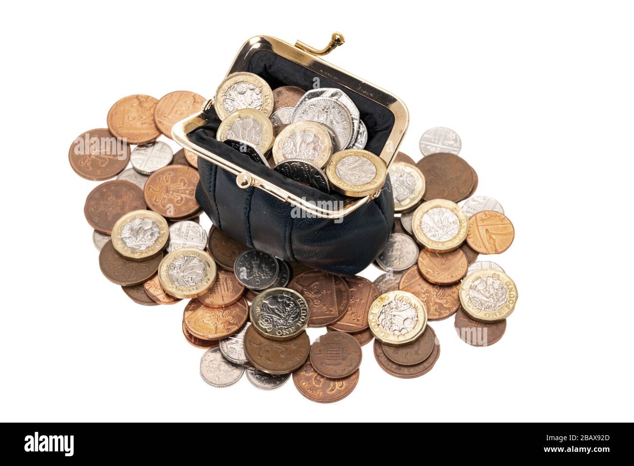 Ladies black leather purse overflowing with coins - white background ...