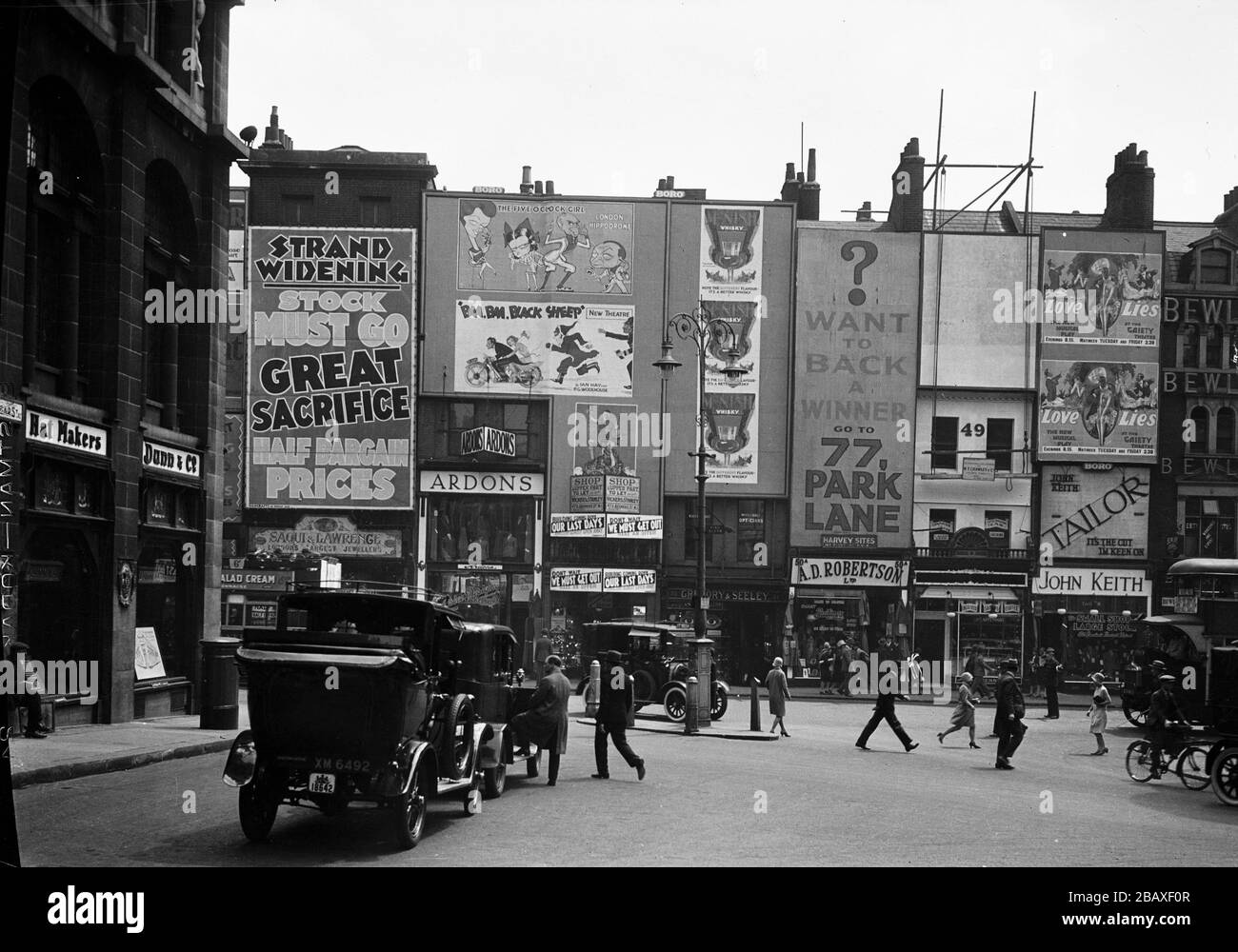 Pedestrians and traffic on the Strand, London, England, United Kingdom ...