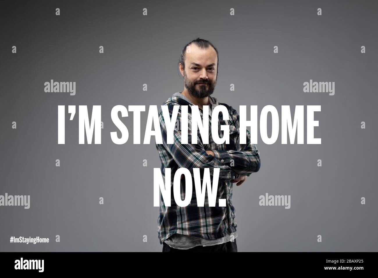 I'M STAYING HOME text over a Half-turn portrait of a friendly looking ...