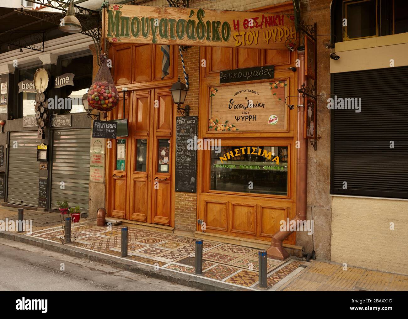 greek pastry shop at psiri, closed coronavirus Stock Photo - Alamy