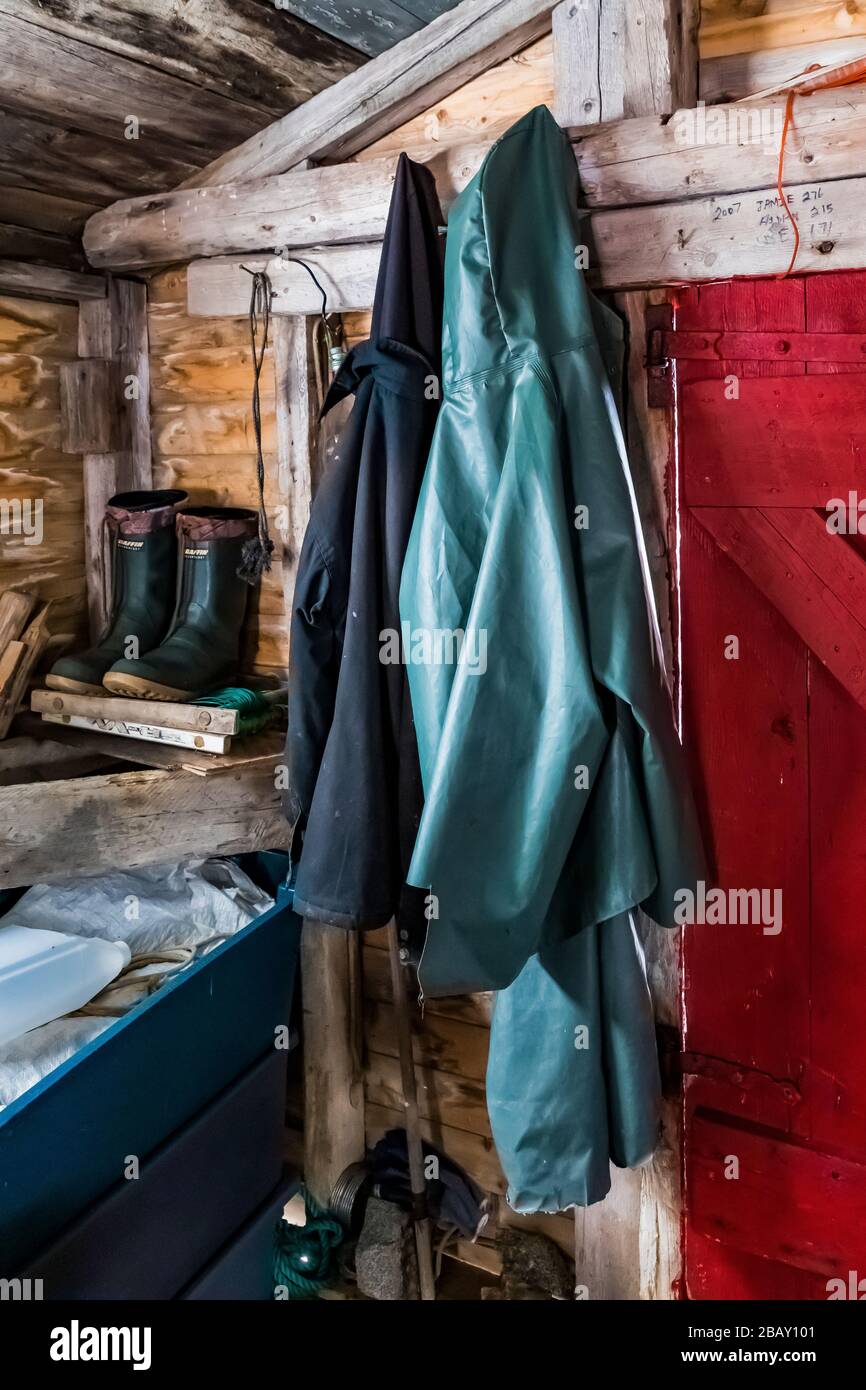Raincoats boots hi-res stock photography and images - Alamy
