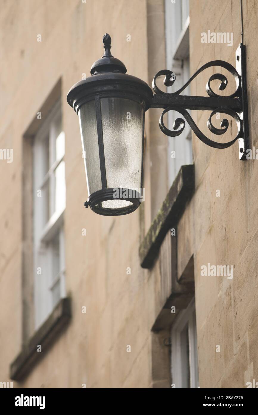 A street light on a building in the historical City of Bath, Somerset ...