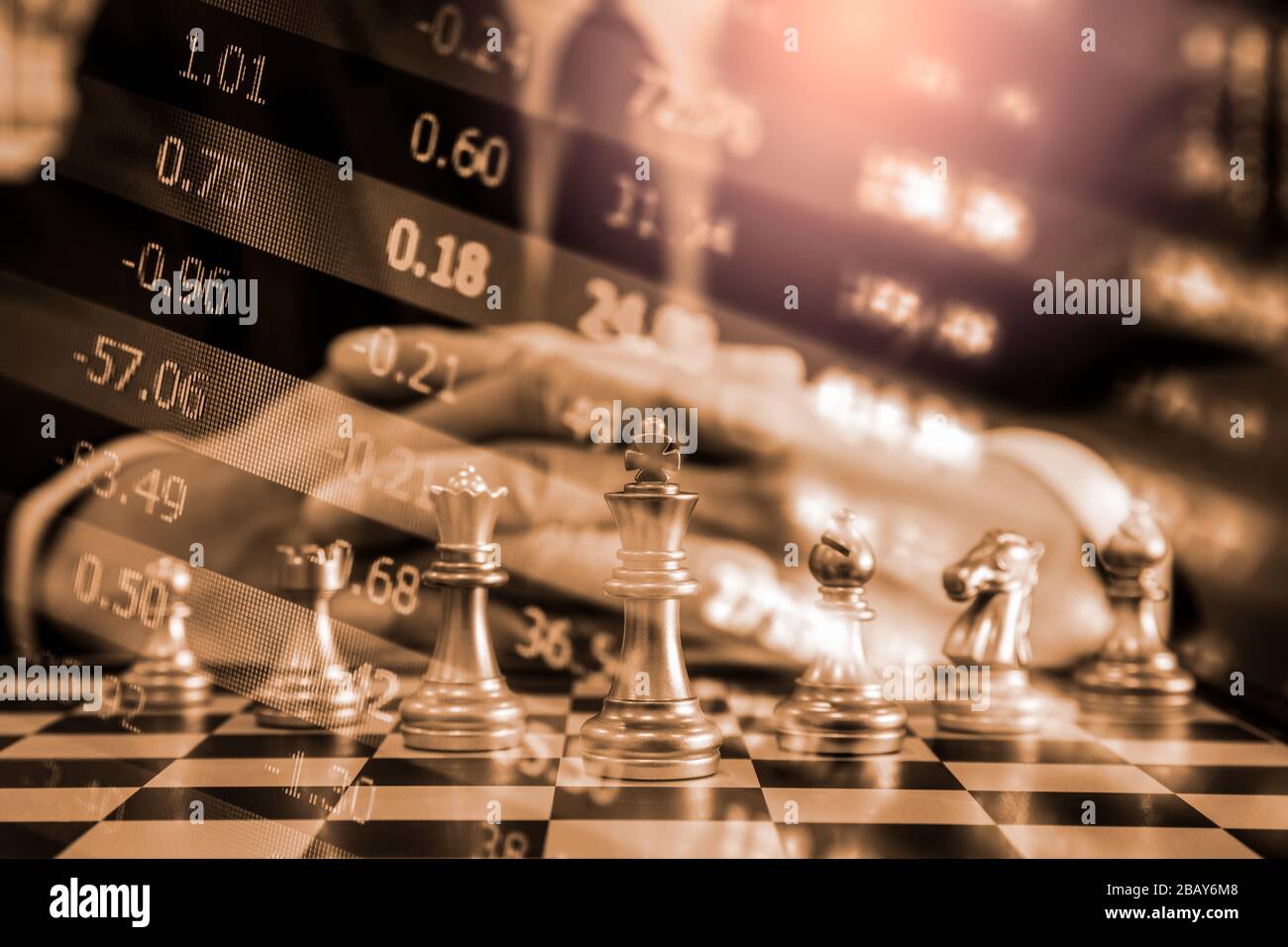 Chess game on chess board on stock market or forex trading graph chart ...
