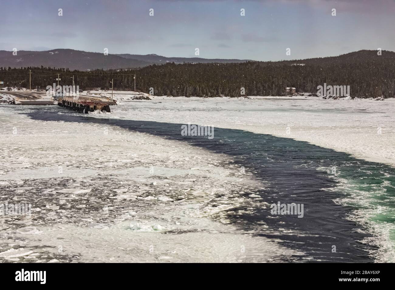 On the ferry in winter, with ice in the water, from Farewell to the ...