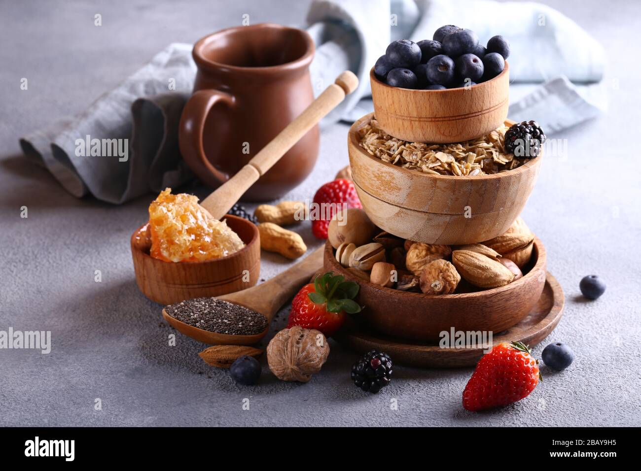 homemade granola with berries and nuts for healthy food Stock Photo - Alamy