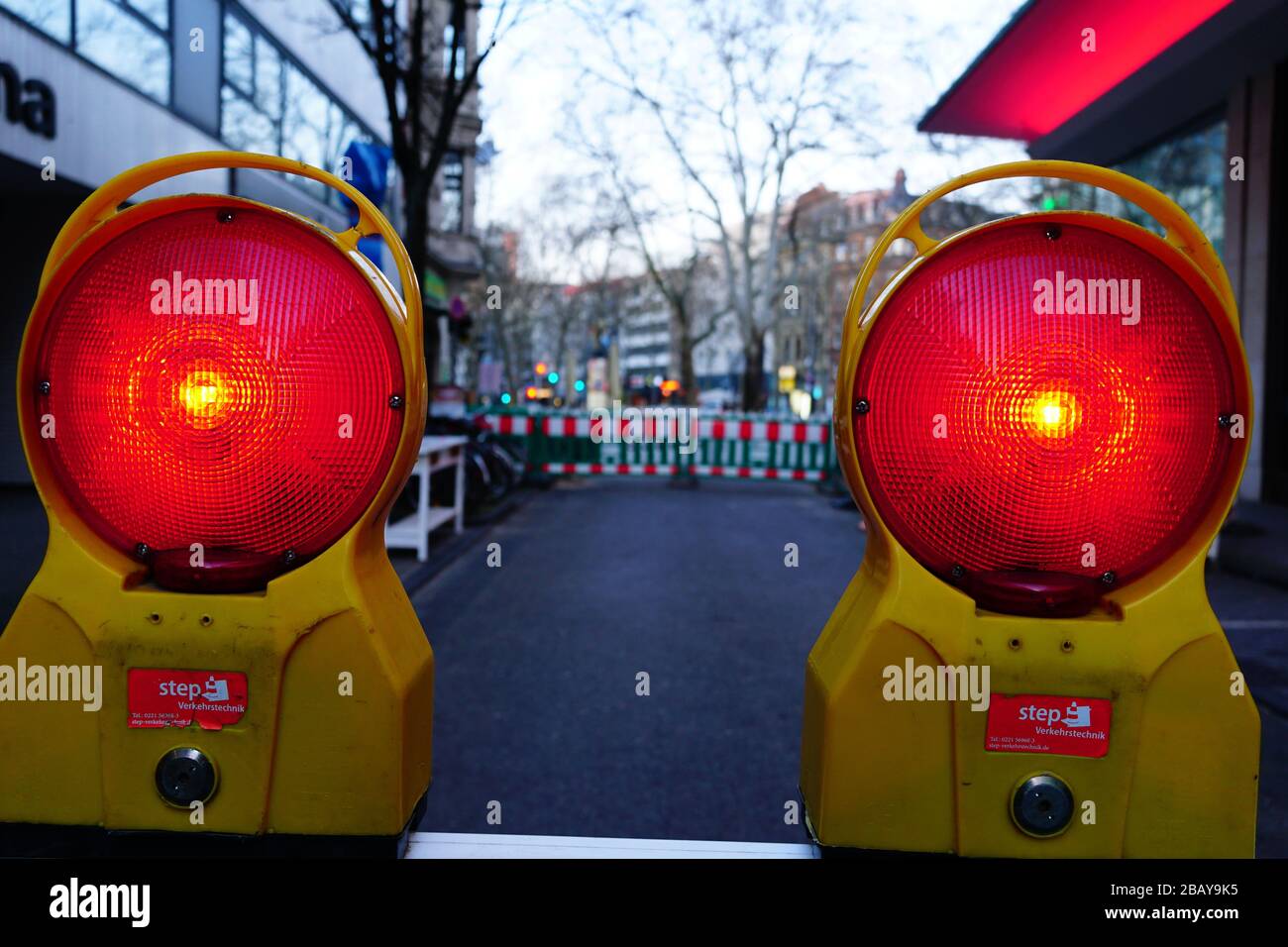 street barricade with stop and warning lights for city lock down due to ...
