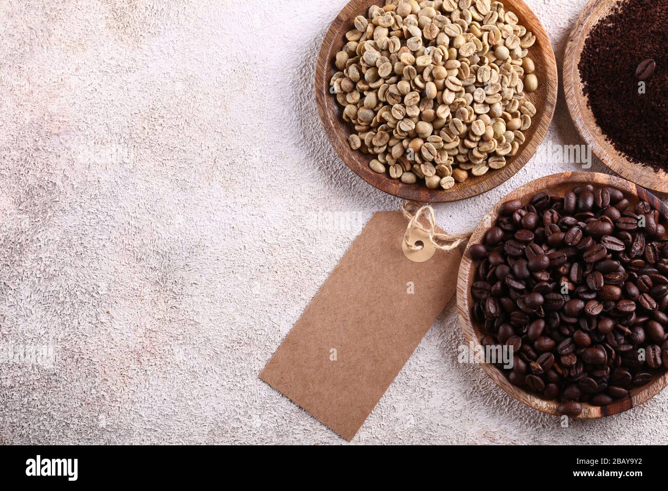 natural organic coffee beans on a light background Stock Photo - Alamy