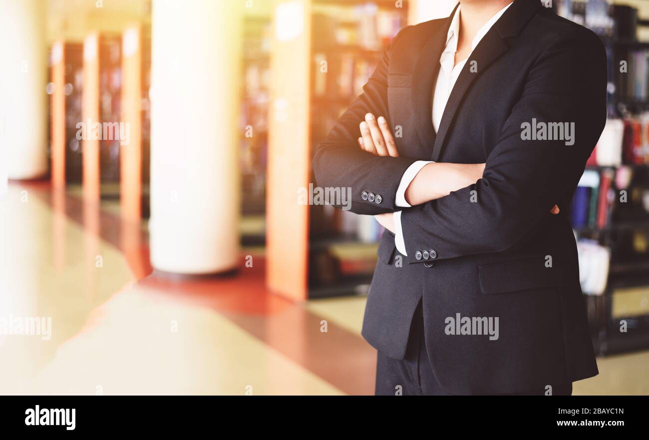 businessman standing in a office / smart business man or student ...