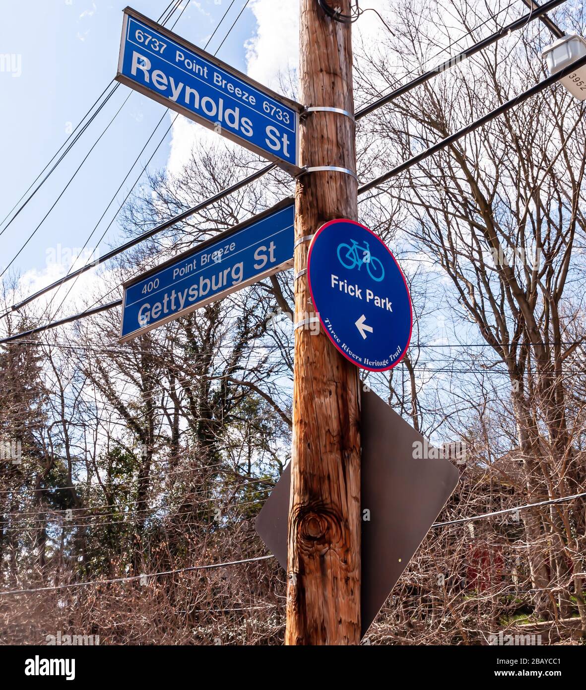 Three visible street signs, Reynolds Street, Gettysburg Street and a ...