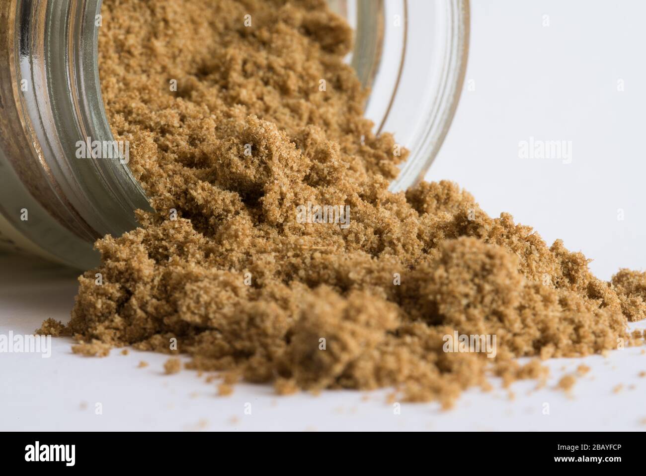 Ground Cumin Spilled from a Spice Jar Stock Photo - Alamy